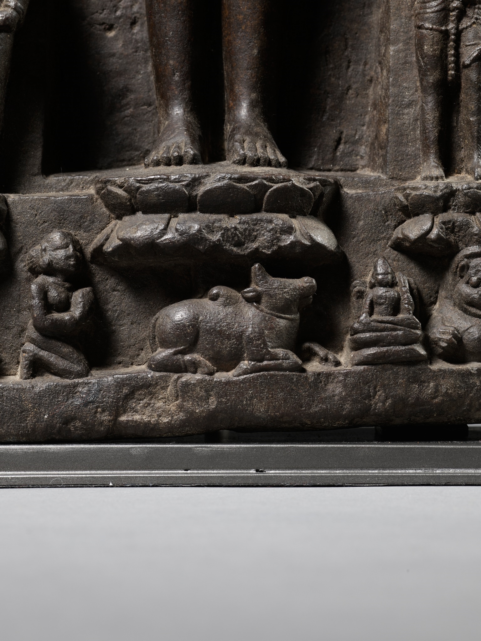 Indian School, 12th Century | A BLACK STONE STELE DEPICTING RISHABHANATHA, THE FIRST TIRTHANKARA ...