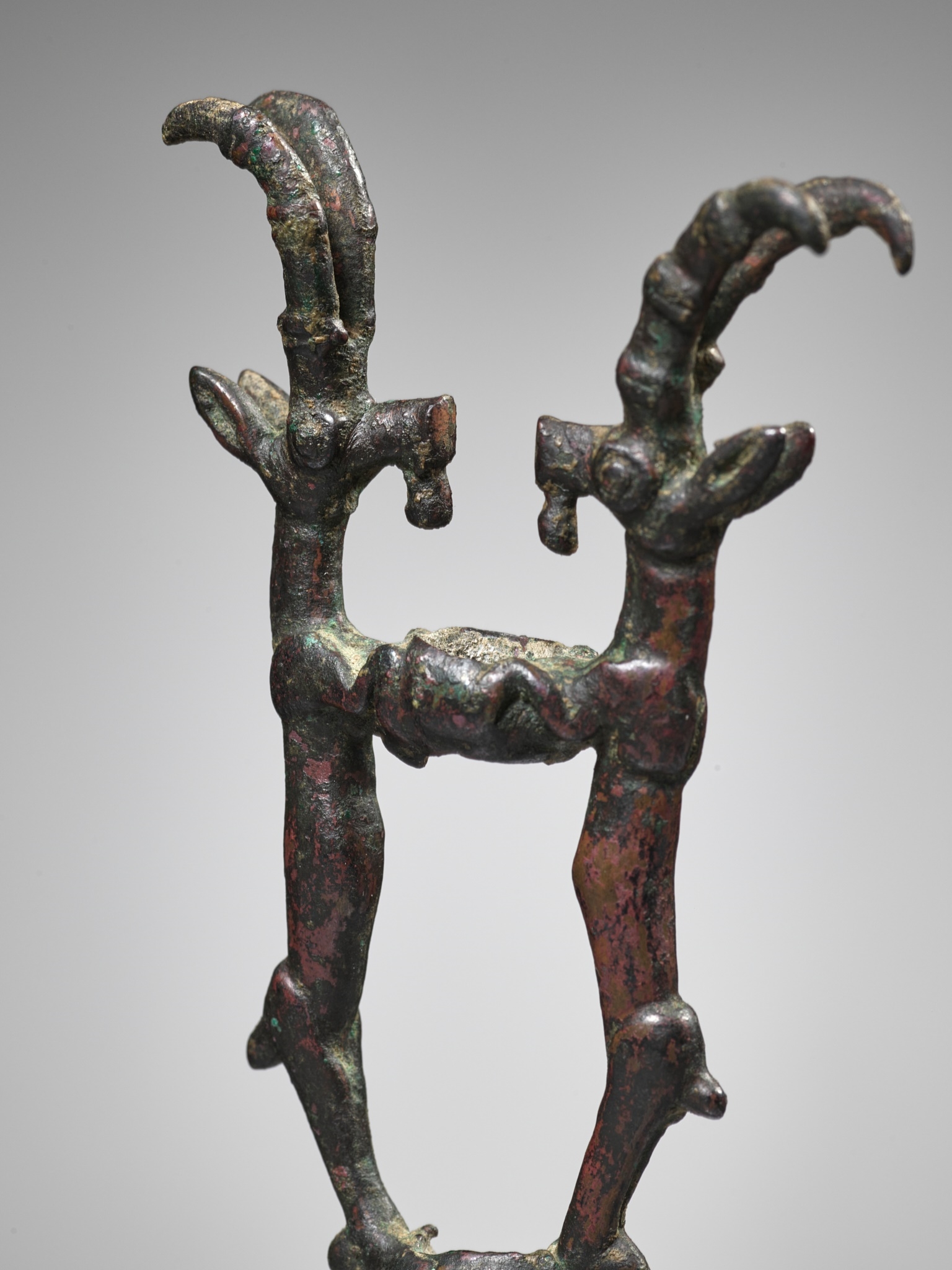 Iranian School | A LURISTAN BRONZE ‘DOUBLE IBEX’ FINIAL, IRAN, CIRCA ...