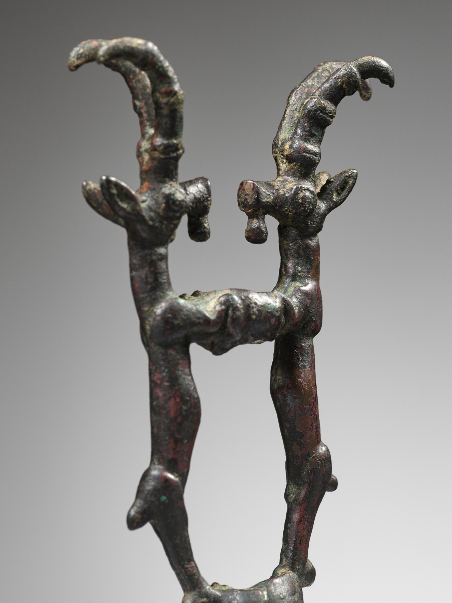 Iranian School | A LURISTAN BRONZE ‘DOUBLE IBEX’ FINIAL, IRAN, CIRCA ...