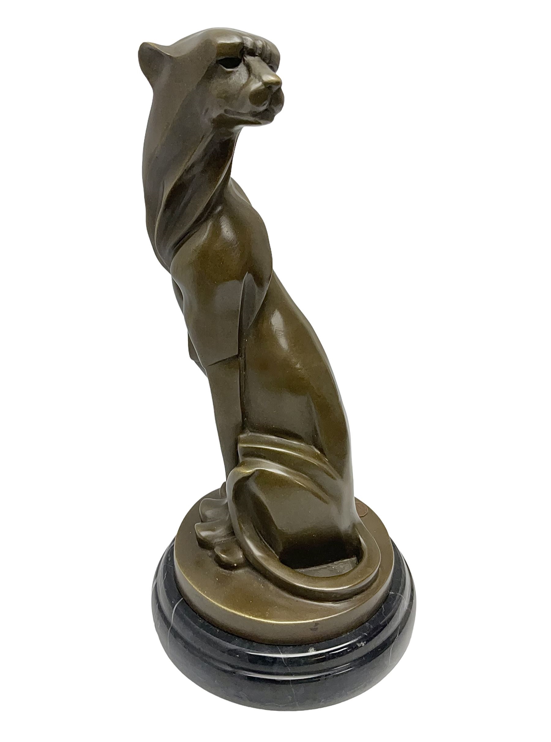 Miguel Fernando López (Milo) | modelled as a stylised sitting cheetah ...