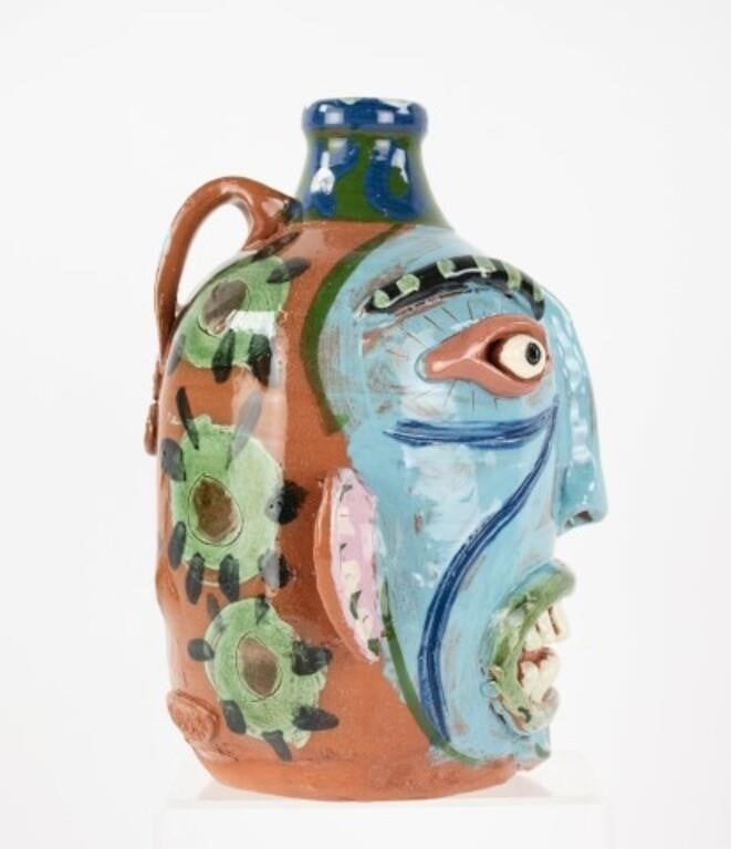 Carl Block | Folk art multi-glaze face jug having a blue face and open ...