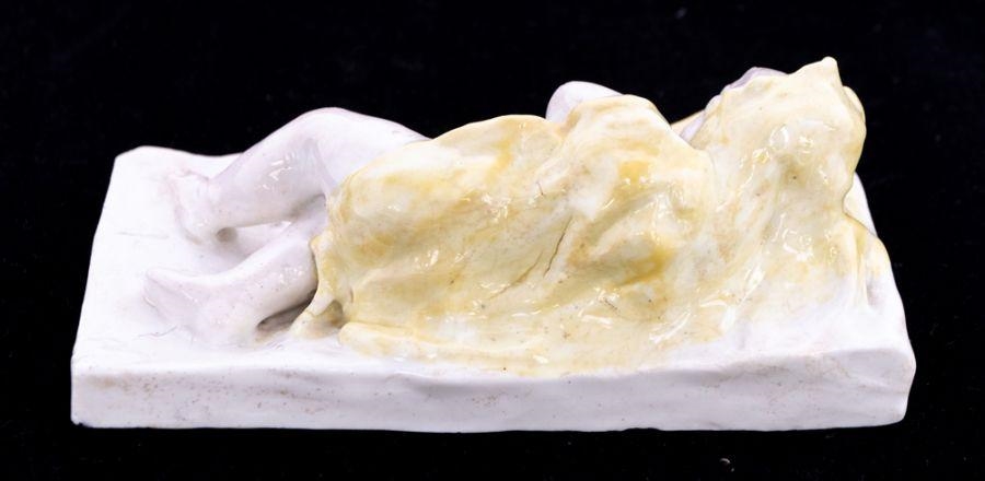 British School, 21st Century | A Chelsea porcelain model of a sleeping ...