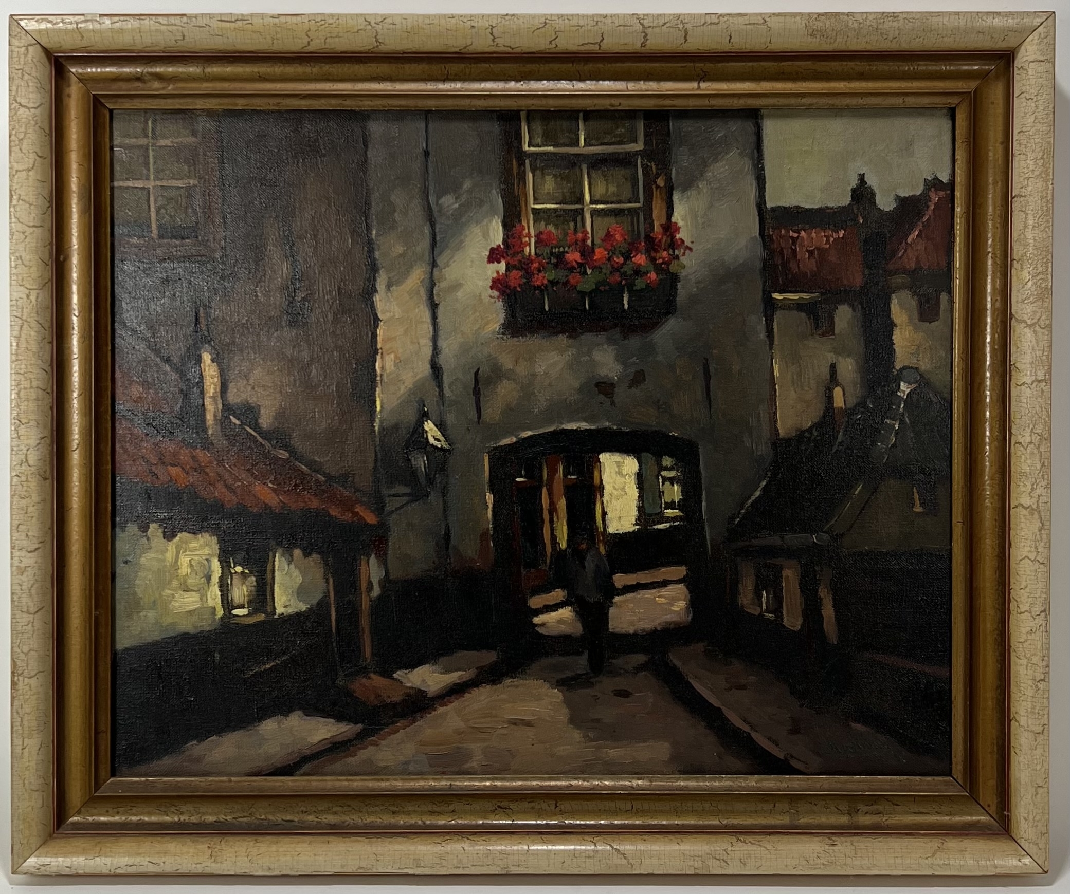 L. Hartman | een stadsgezicht met poort en wandelende man. | MutualArt