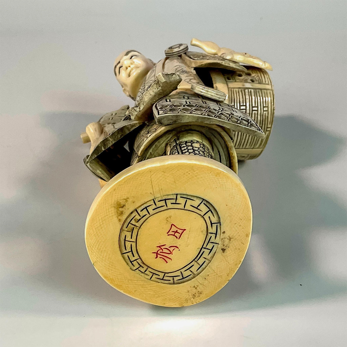 Japanese School | FIGURINE OF A TRAVELING MERCHANT | MutualArt