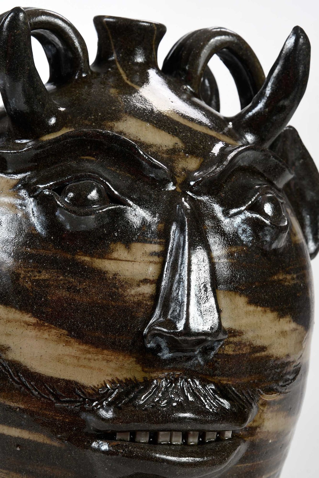 Michael Bayne | Swirl Double Devil Face Jug | MutualArt