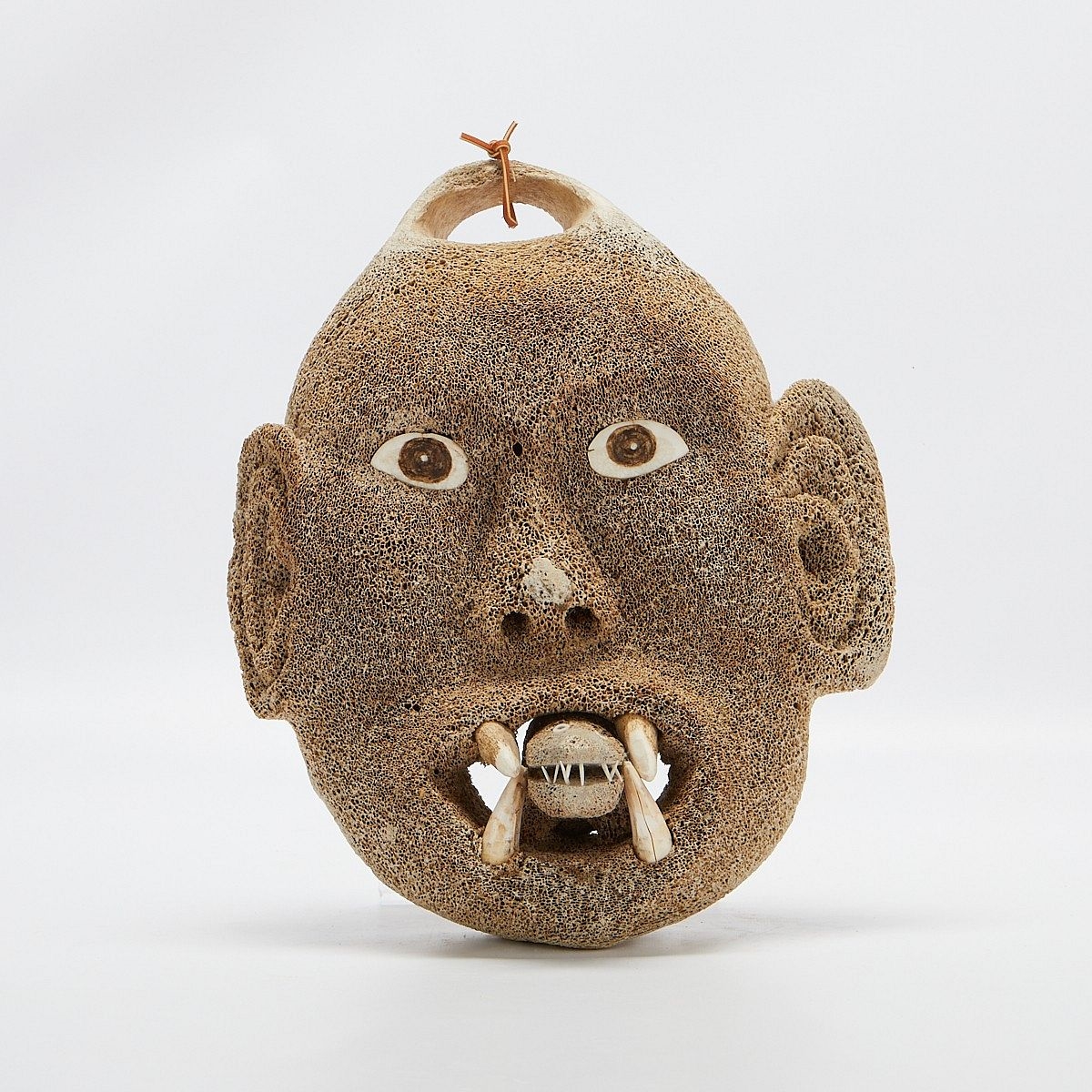 Native American School | Inuit carved bone mask. With a snake emerging ...