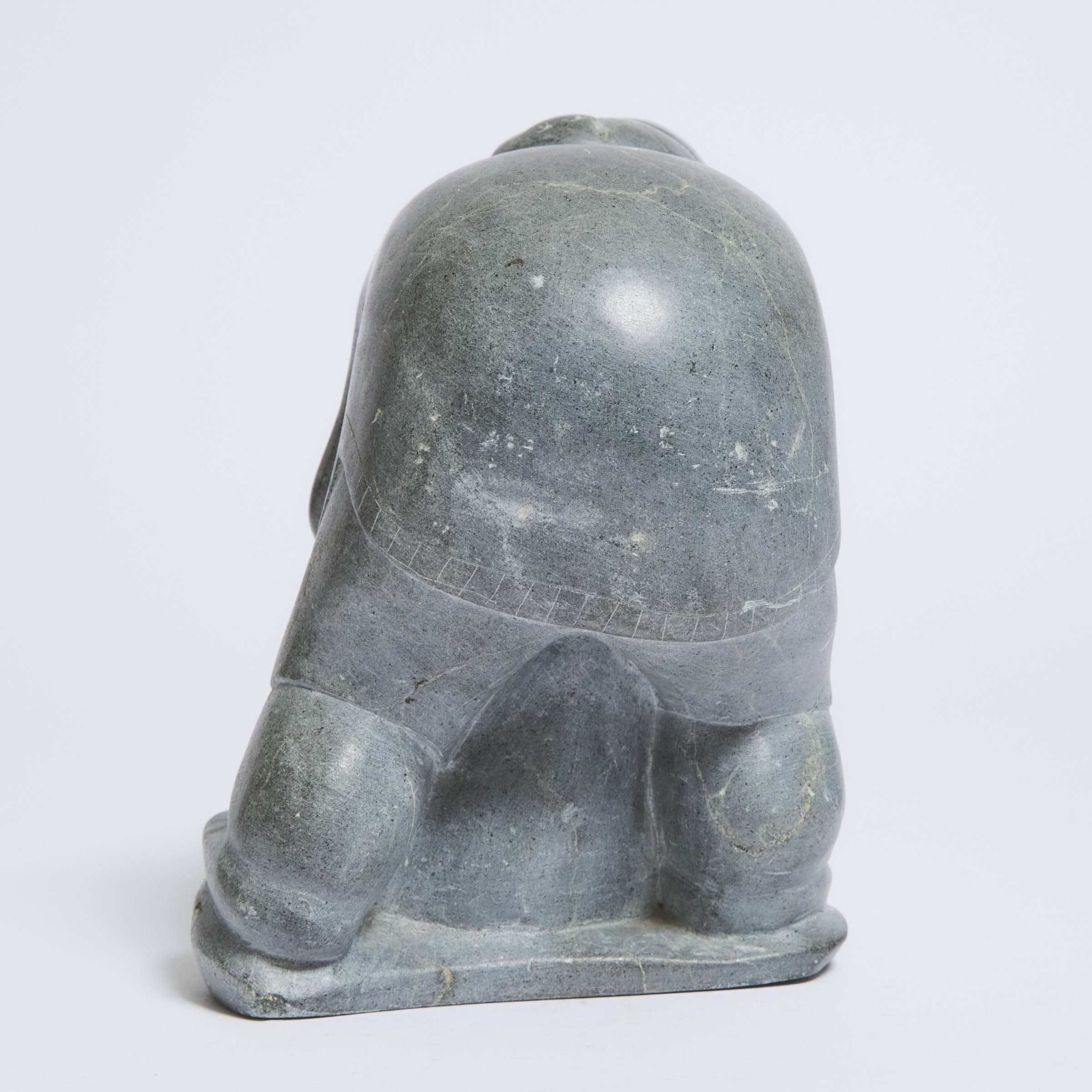 Lucassie Echalook | FIGURE CROUCHING OVER WALRUS | MutualArt