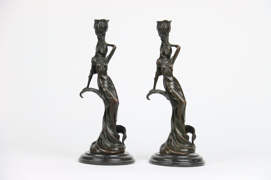 Milo Martin | Two young damsels with long dresses forming candleholders ...