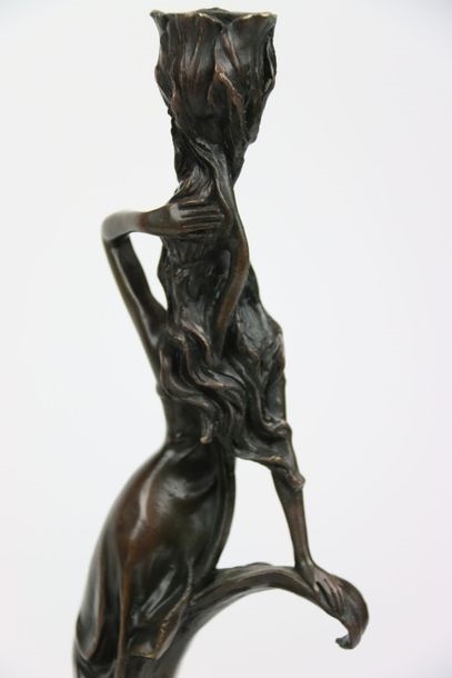 Milo Martin | Two young damsels with long dresses forming candleholders ...