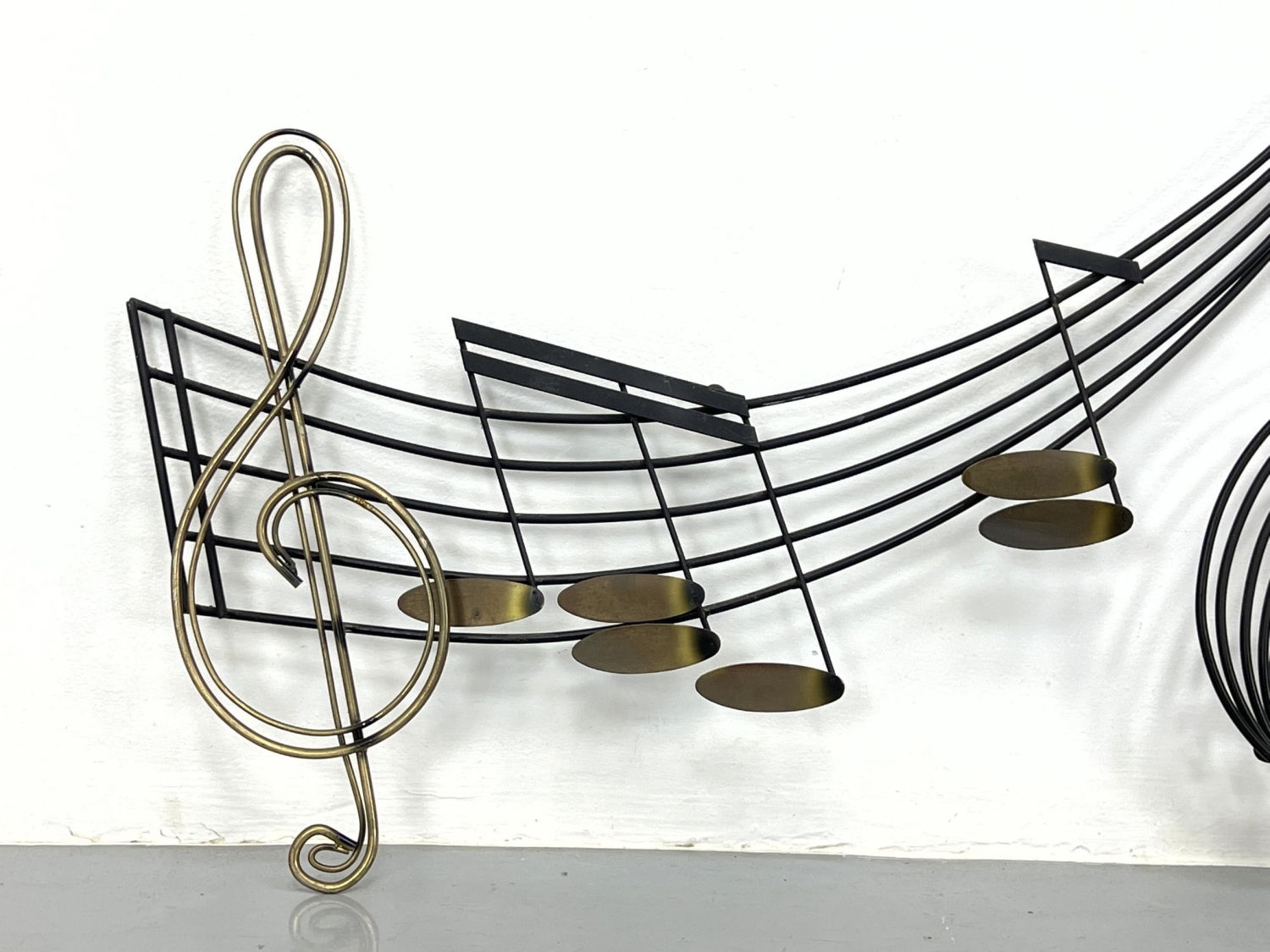Curtis Jeré | 1988 wall sculpture Music Notes (1988) | MutualArt