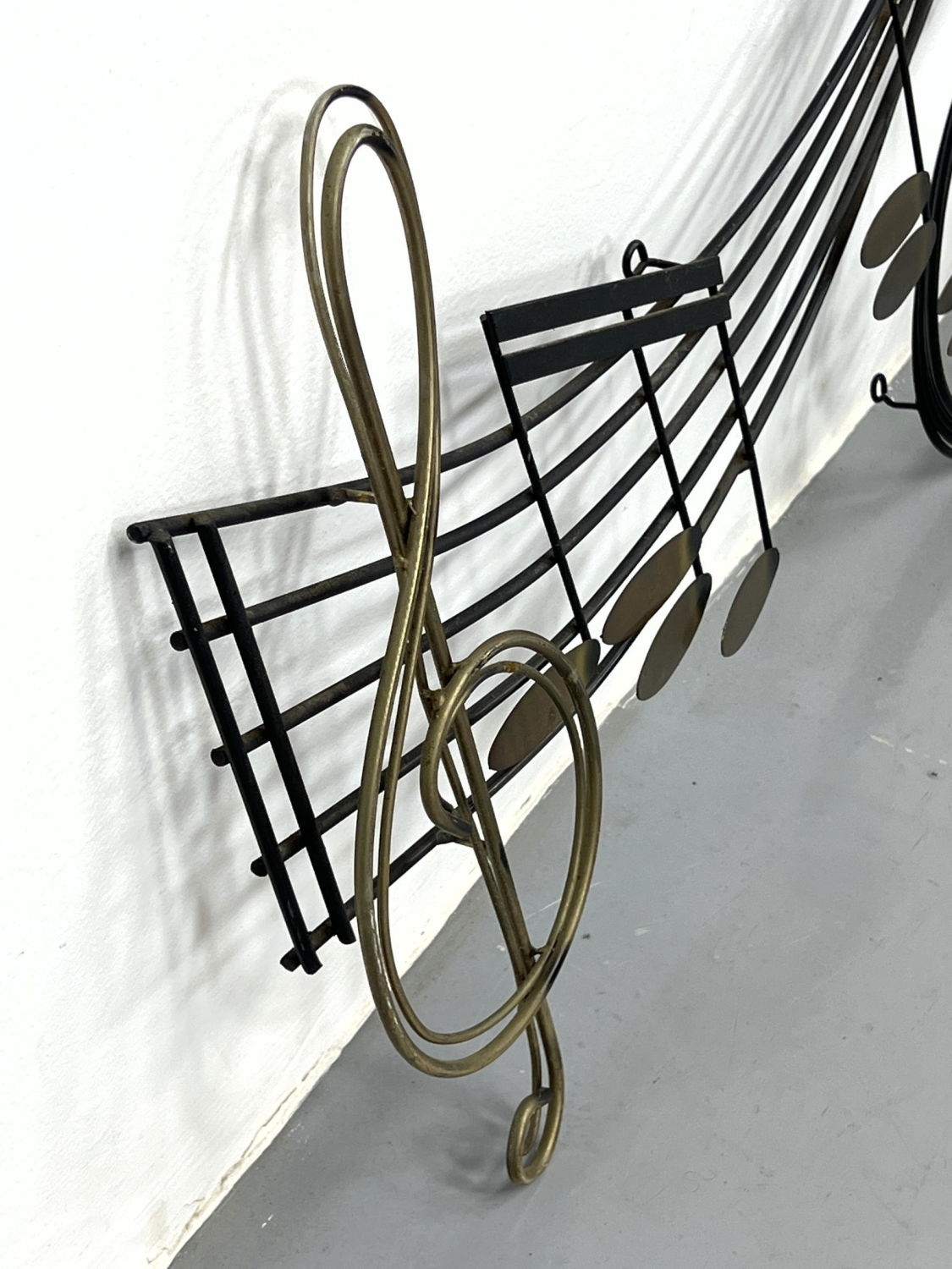 Curtis Jeré | 1988 wall sculpture Music Notes (1988) | MutualArt