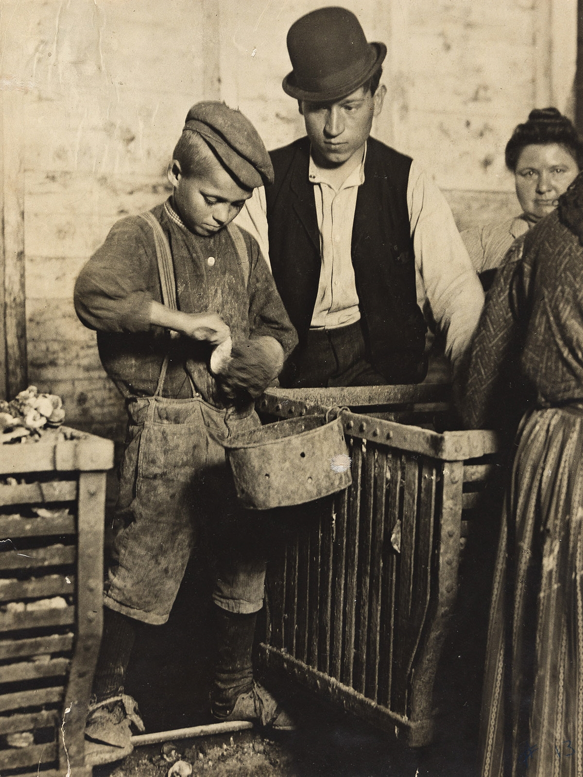 Lewis Hine | Oyster Shucking on the Gulf Coast. (1915) | MutualArt