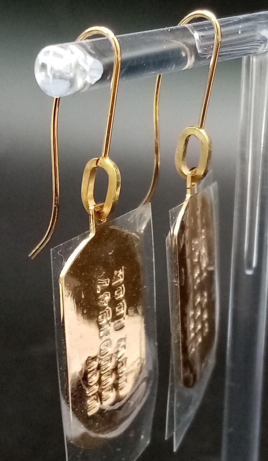 Christian Dior | A Pair of Christian Dior Gilded Tag Earrings ...