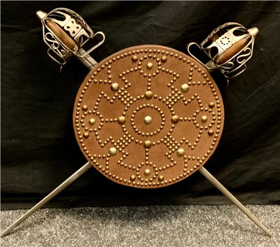 David Smith | A pair of reproduction basket hilt swords with targe ...