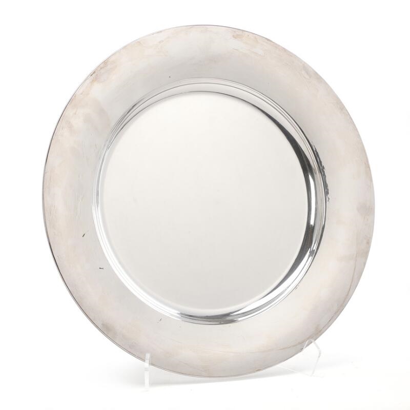Paul Bang | A circular silver dish with lightly hammered surface | MutualArt
