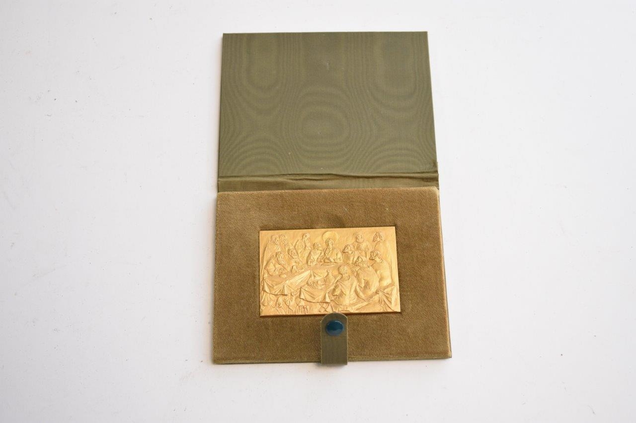 Enrico Manfrini | a gilt metal plaque of the Last Supper | MutualArt