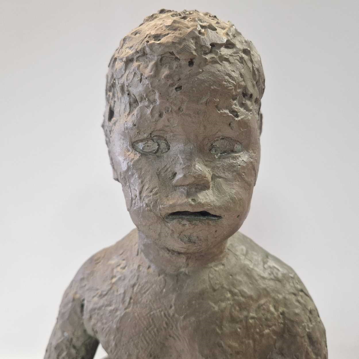 Daphne Hardy Henrion | a bronzed plaster model of a squatting child ...