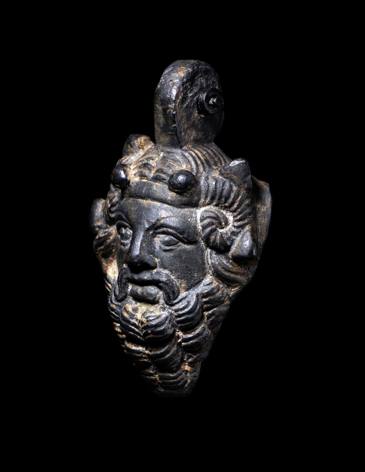 Roman School, 2nd Century | A Roman Bronze Zeus-Ammon Applique | MutualArt
