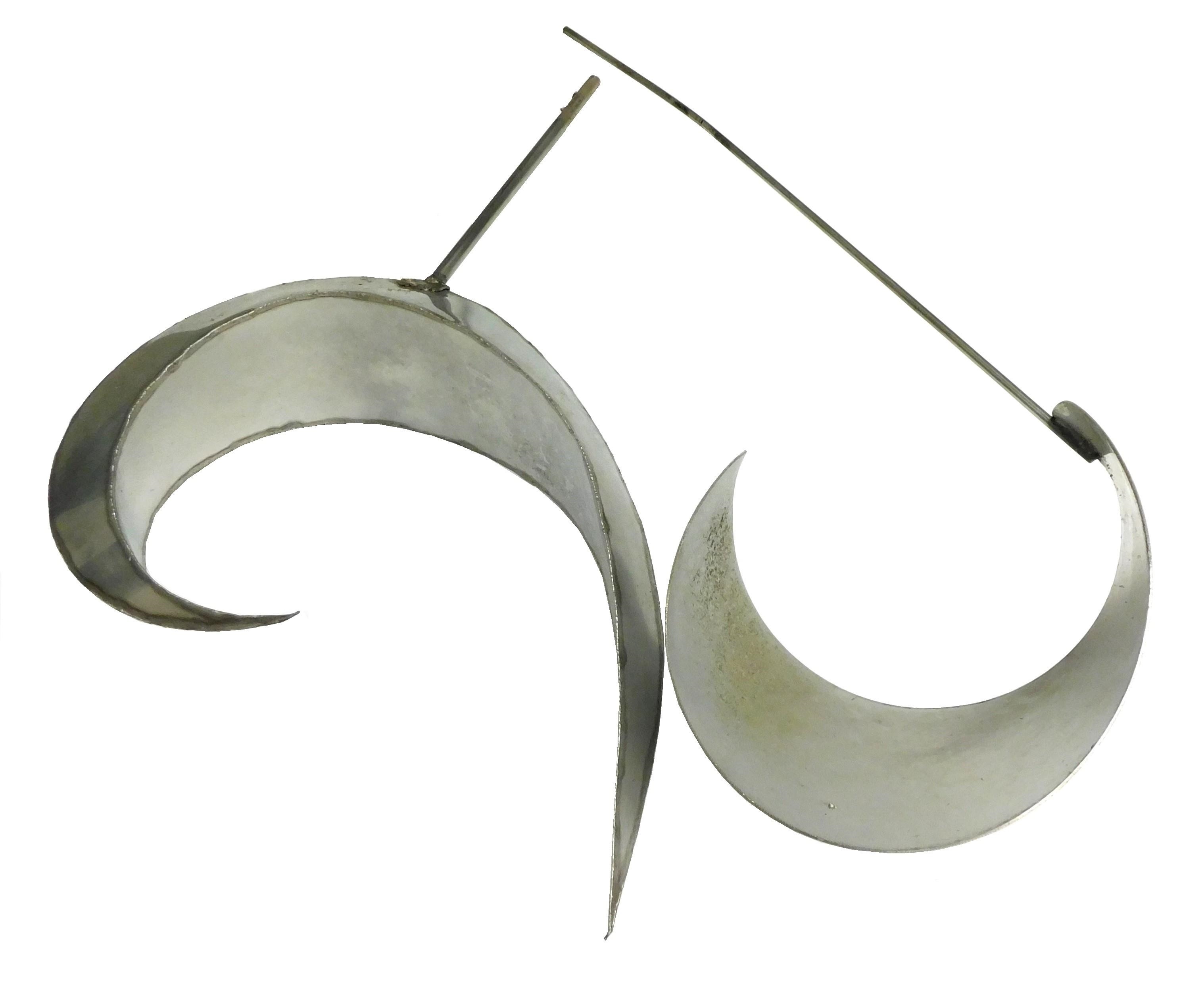 Morton Fishman | two crescent form sculptures on rod | MutualArt