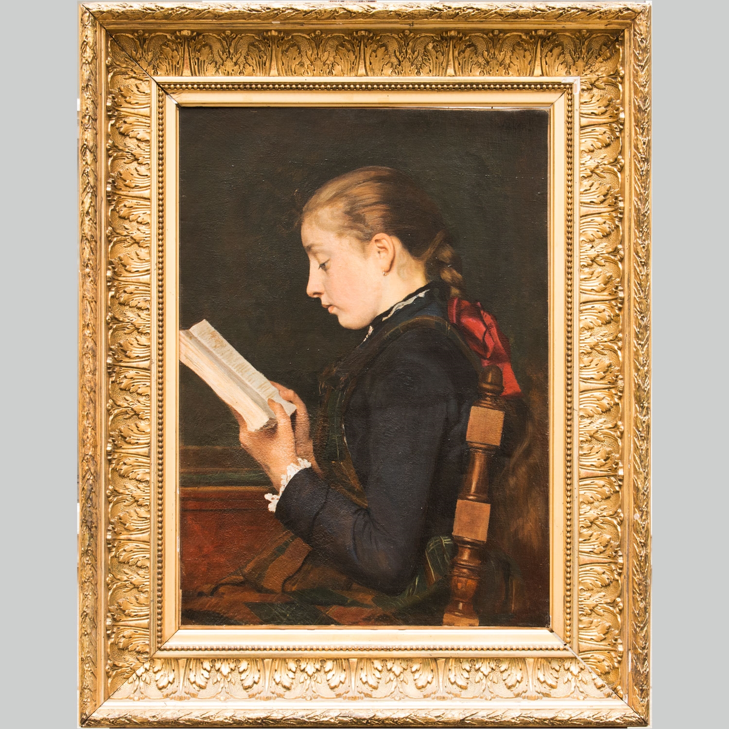 Albert Anker | Portrait of a girl reading a book sitting on the chair ...