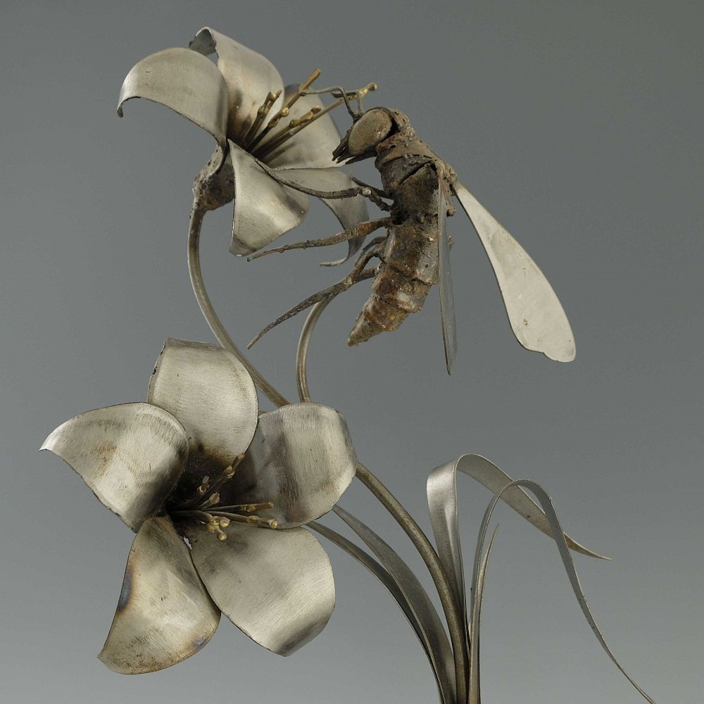 Walenty Pytel | a welded metal sculpture of a bee/wasp and flowers ...
