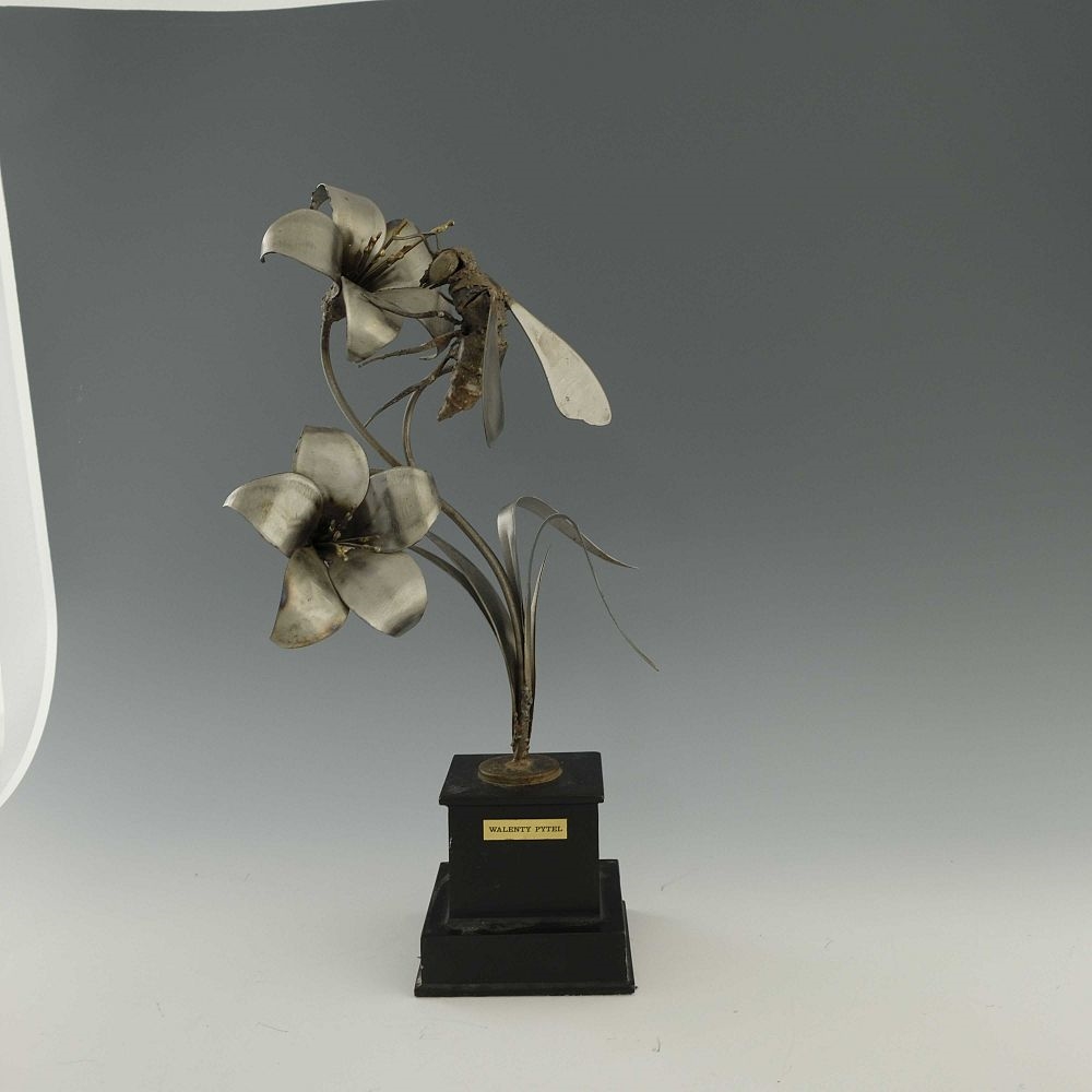 Walenty Pytel | a welded metal sculpture of a bee/wasp and flowers ...