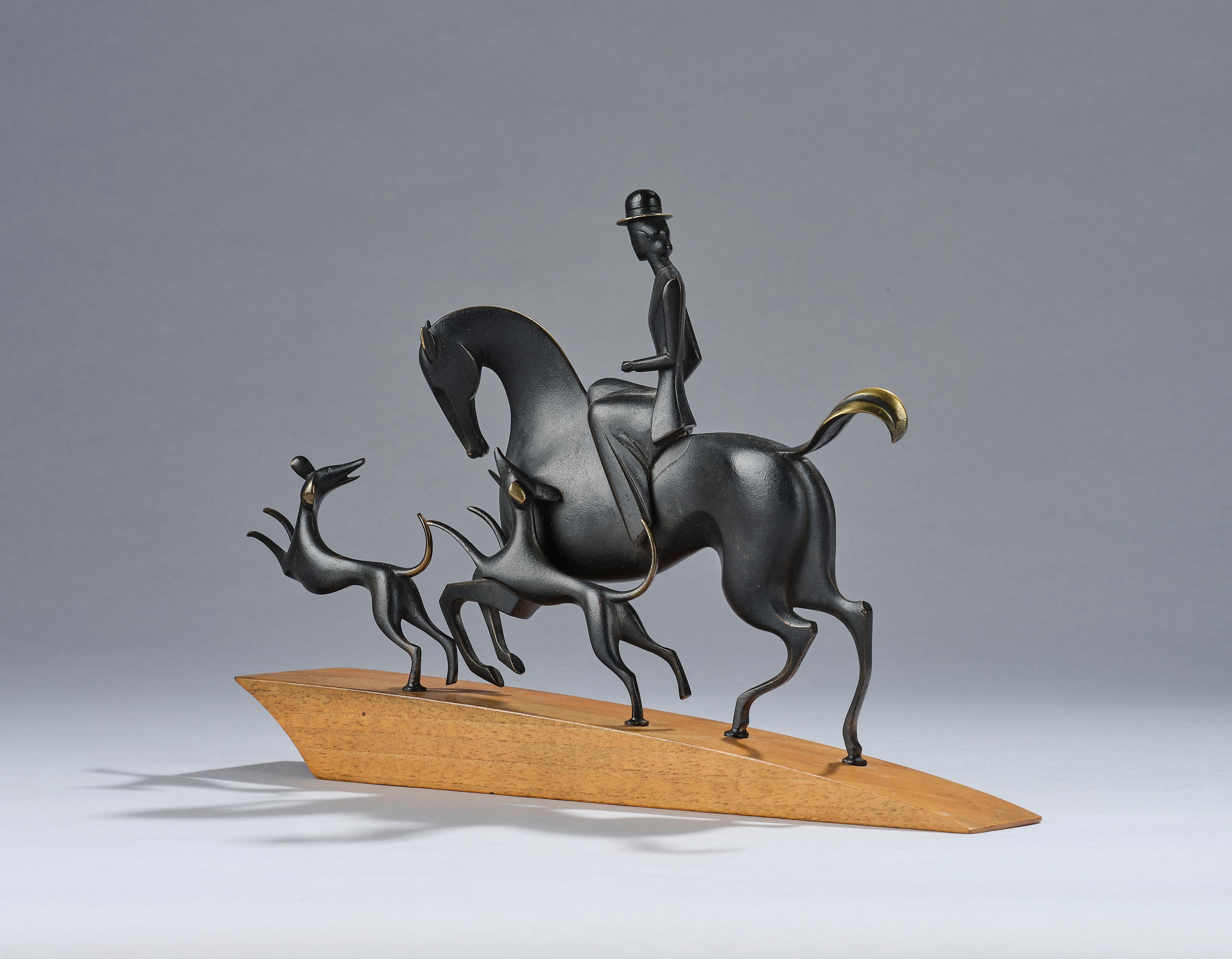 Hagenauer Werkstätten | Female equestrian with two dogs | MutualArt