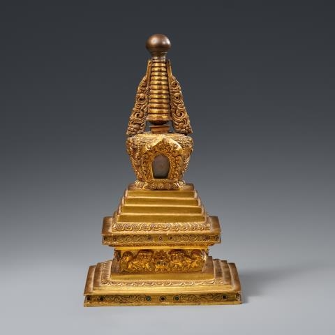 Tibetan School, 18th Century | A Tibetan fire-gilt bronze bumpa-stupa ...