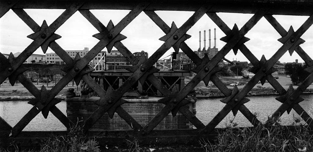 Brendan Read | View of Darling Harbour through the wrought iron barrier ...