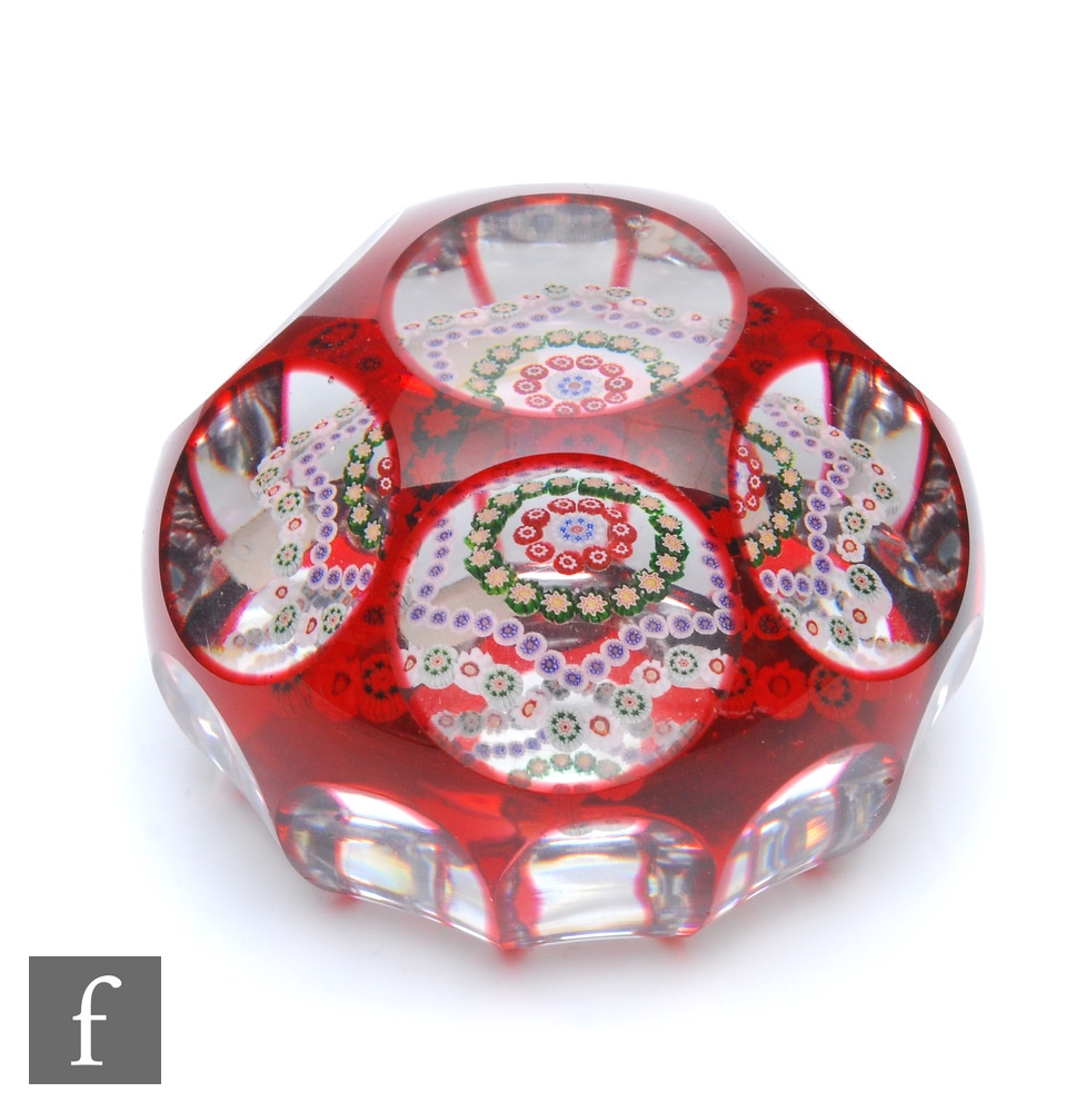 Baccarat | A Baccarat glass overlay paperweight internally decorated ...