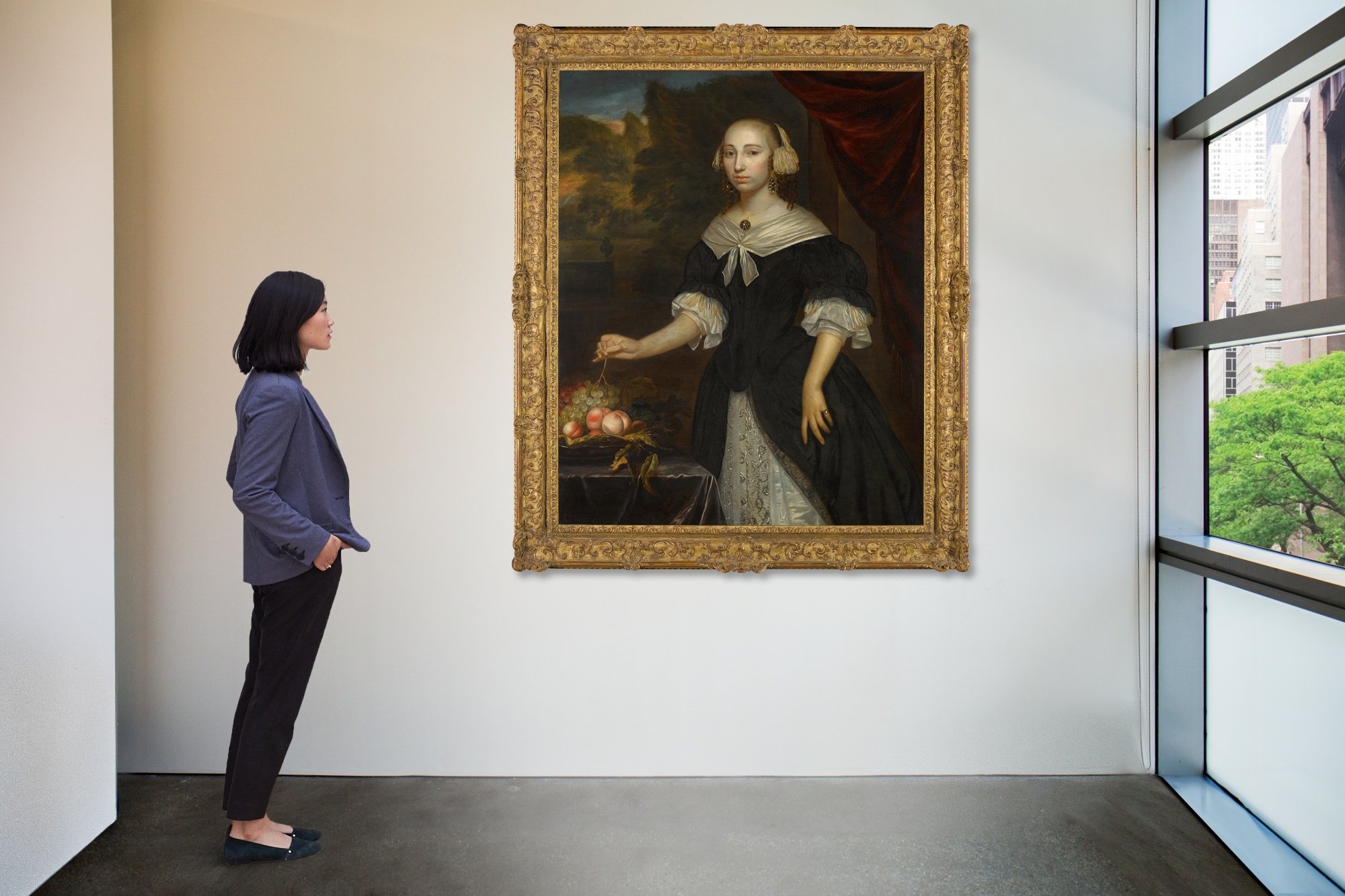 Herman Verelst | Portrait of a lady, three-quarter length, standing next to a still life of ...