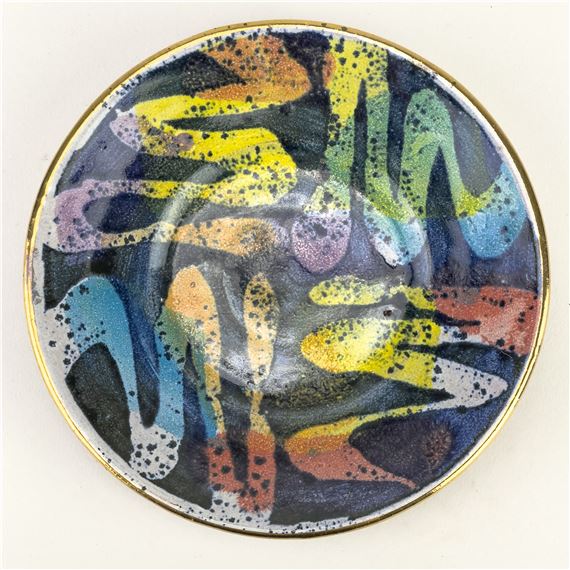 David Constantine | a slip decorated cup and saucer | MutualArt