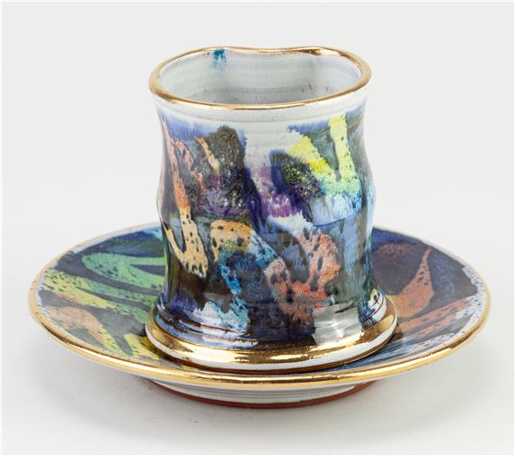 David Constantine | a slip decorated cup and saucer | MutualArt