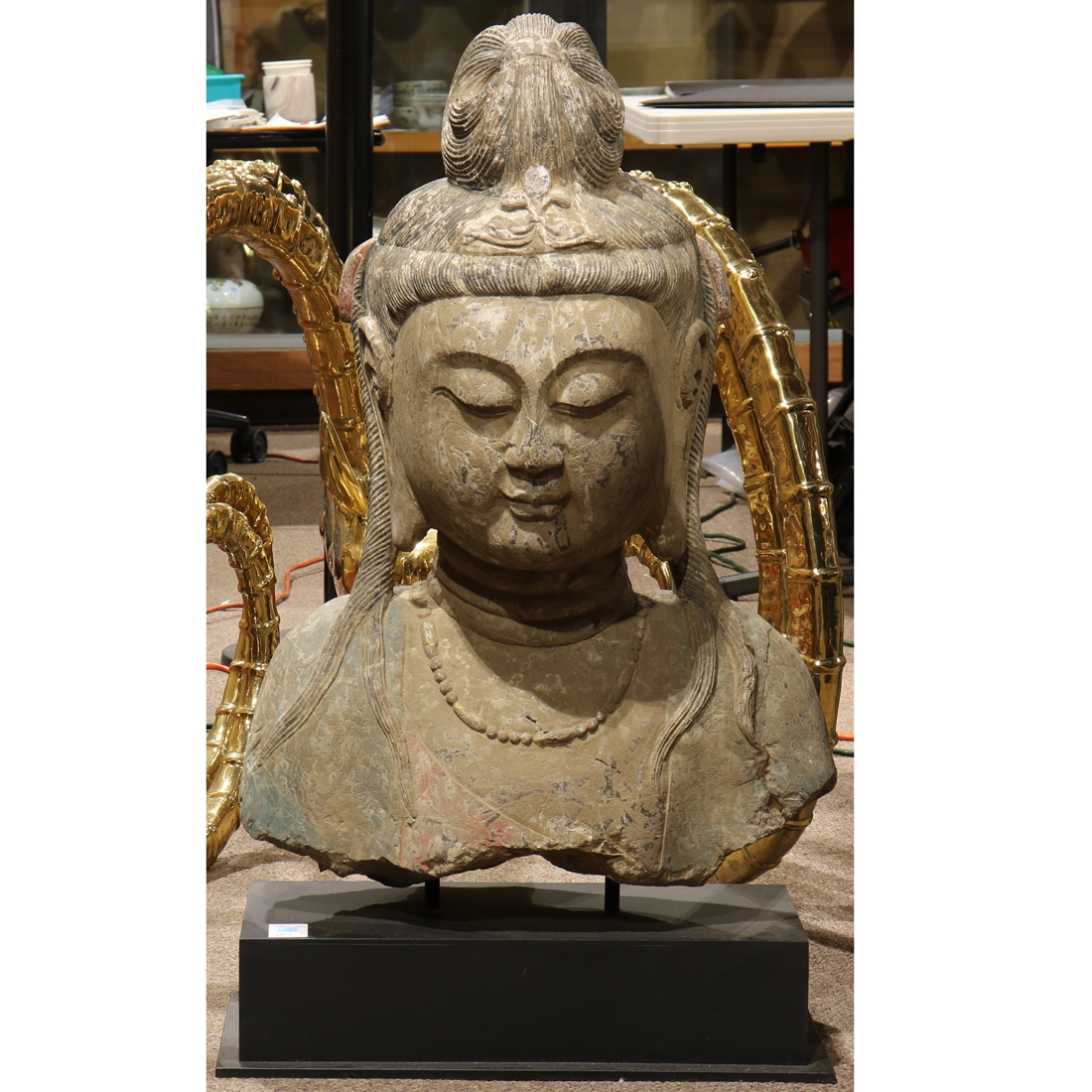 Chinese School | Large Chinese polychrome stone bust of Guanyin | MutualArt