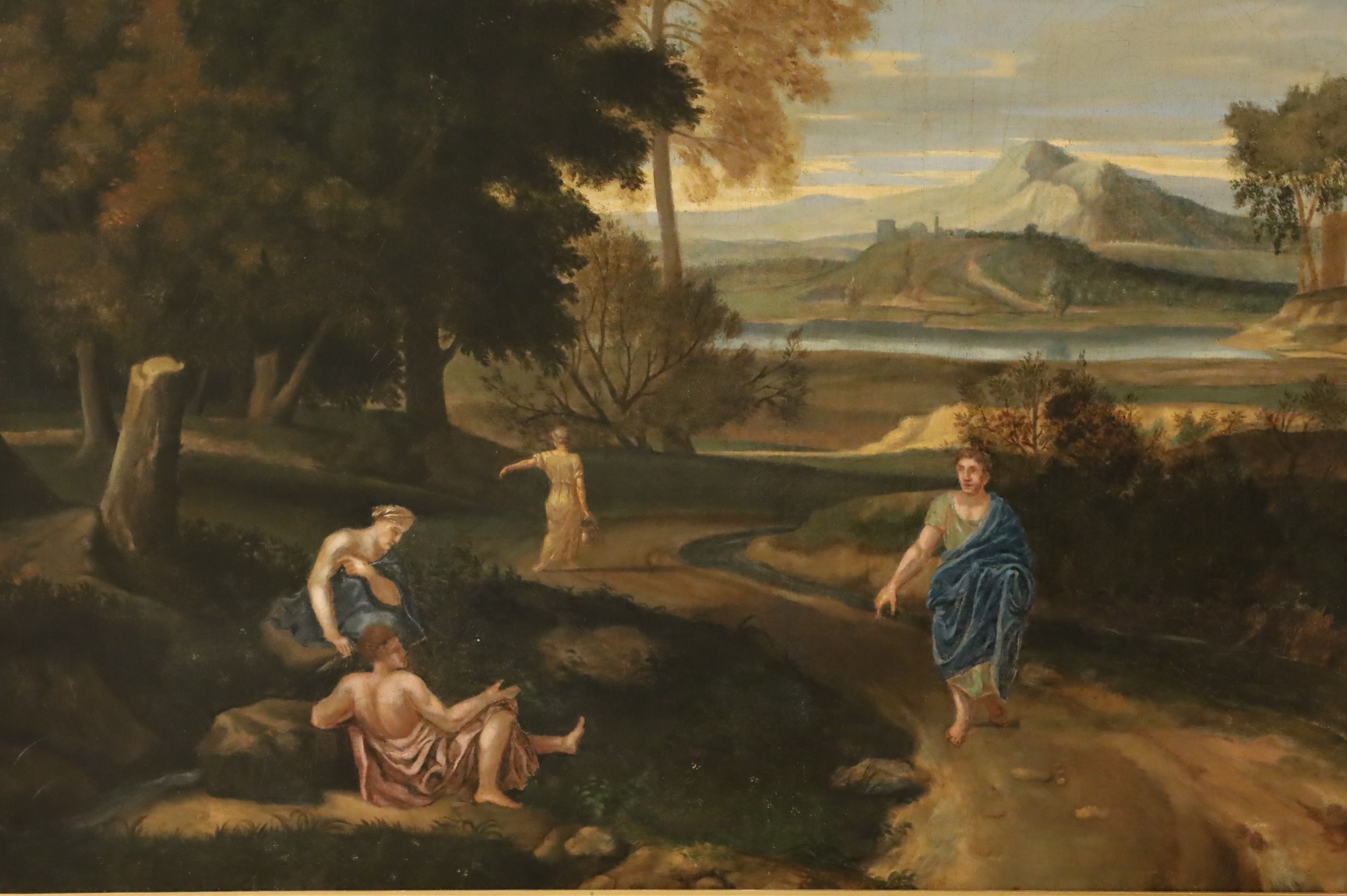 Gaspard Dughet | Figures along a path with structures near a lake and ...