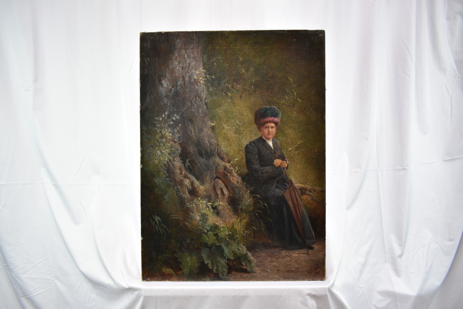 Edward Batty | Lady seated in a wooded dell (1916) | MutualArt