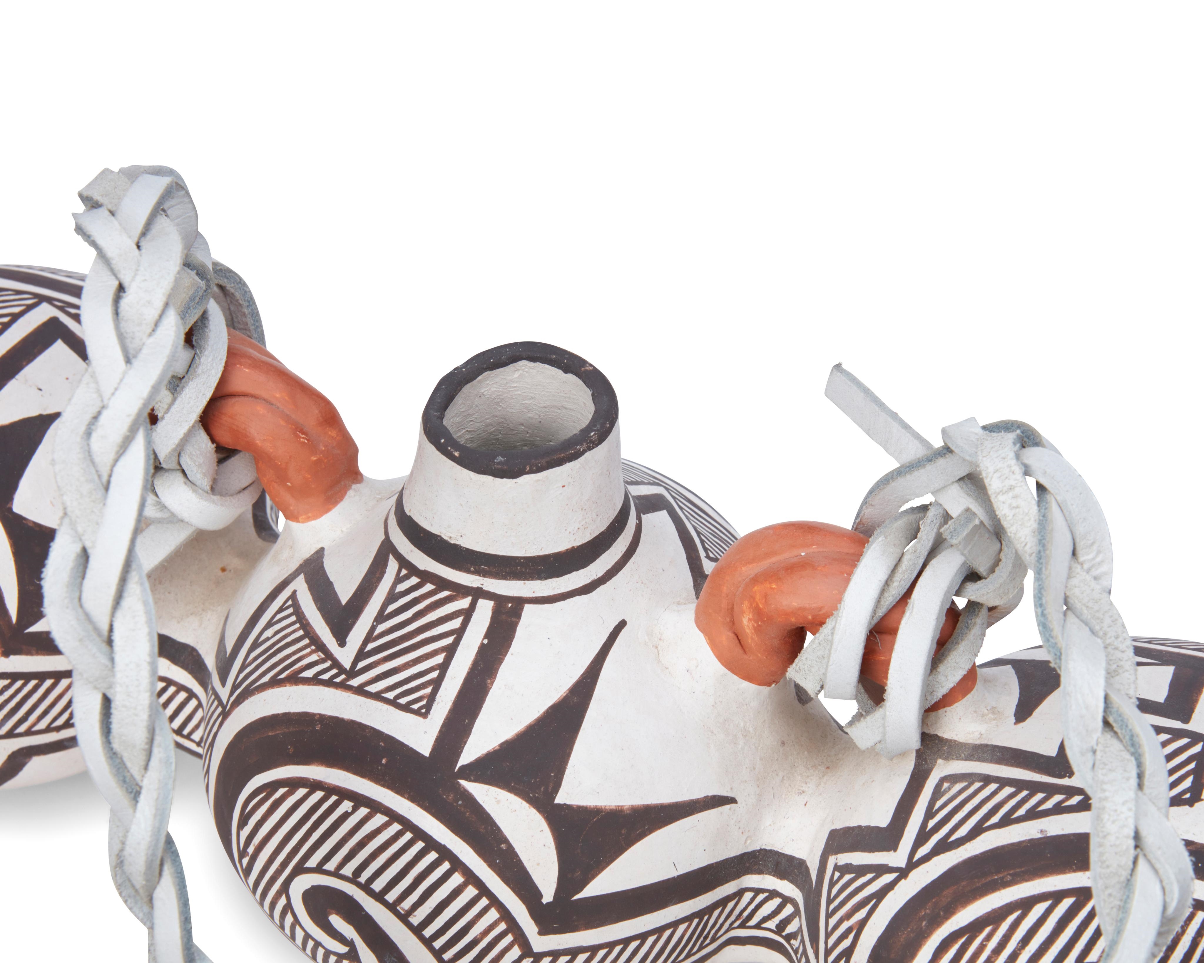 Juana Leno | An Acoma triple lobe canteen (Circa 1998) | MutualArt