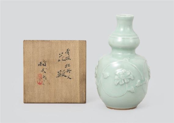 Yaichi Kusube | Celadon vase with design of peony | MutualArt