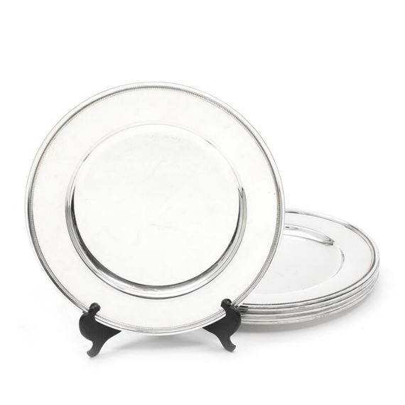 A. Dragsted | A set of eight silver plated place plates decorated with ...