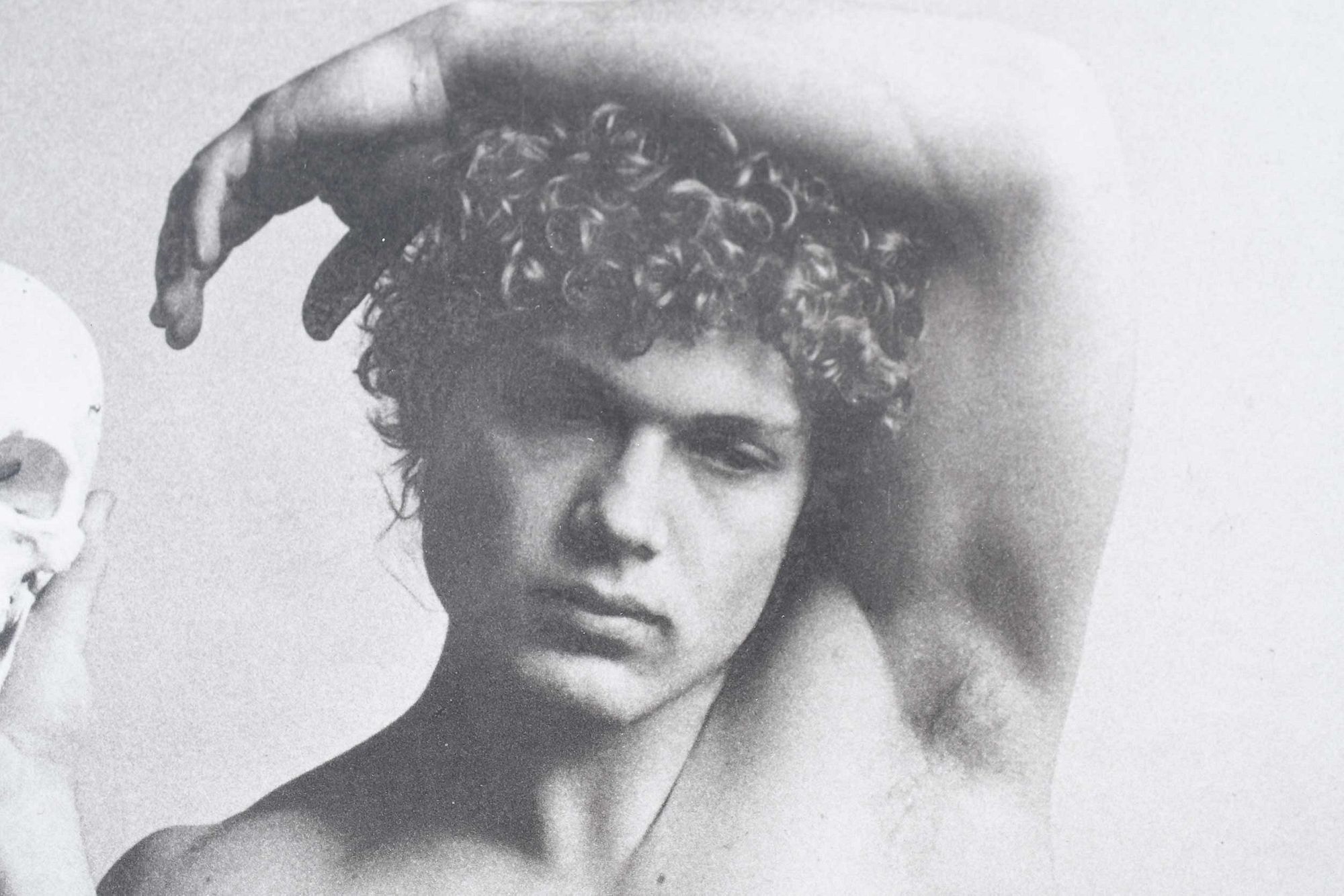 Duane Michals | Man with Skull | MutualArt