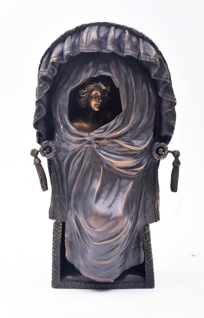 Austrian School, 20th Century | a gold figured nude woman seated in a ...