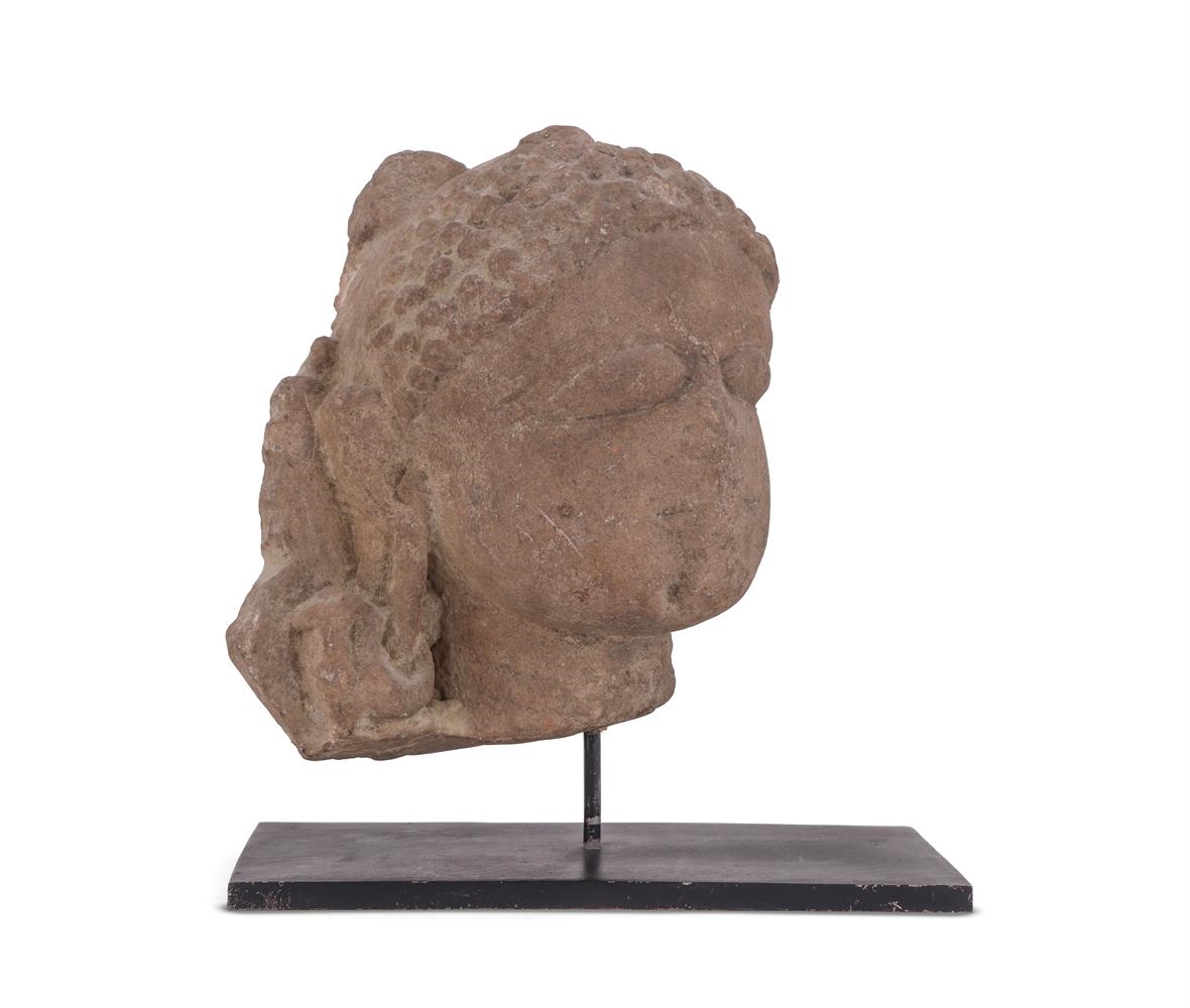 Indian School | An Indian stone head (10th Century) | MutualArt