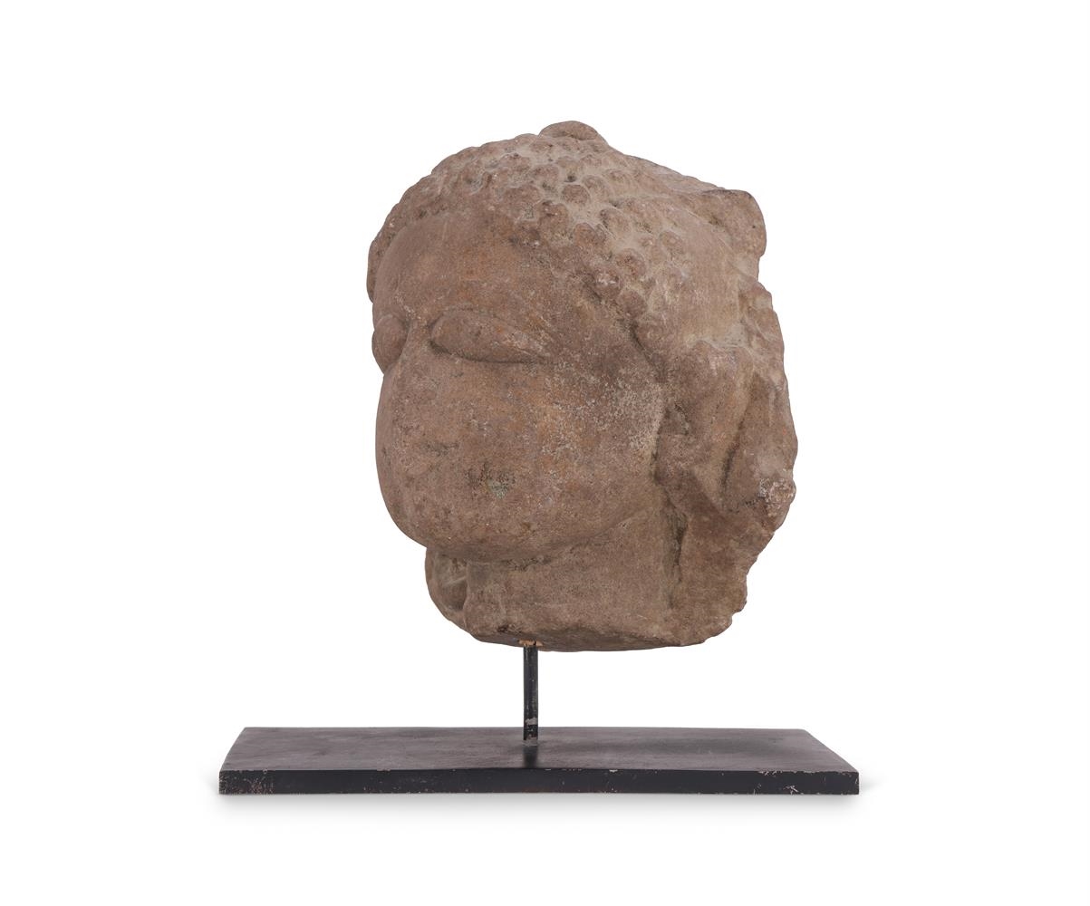 Indian School | An Indian stone head (10th Century) | MutualArt