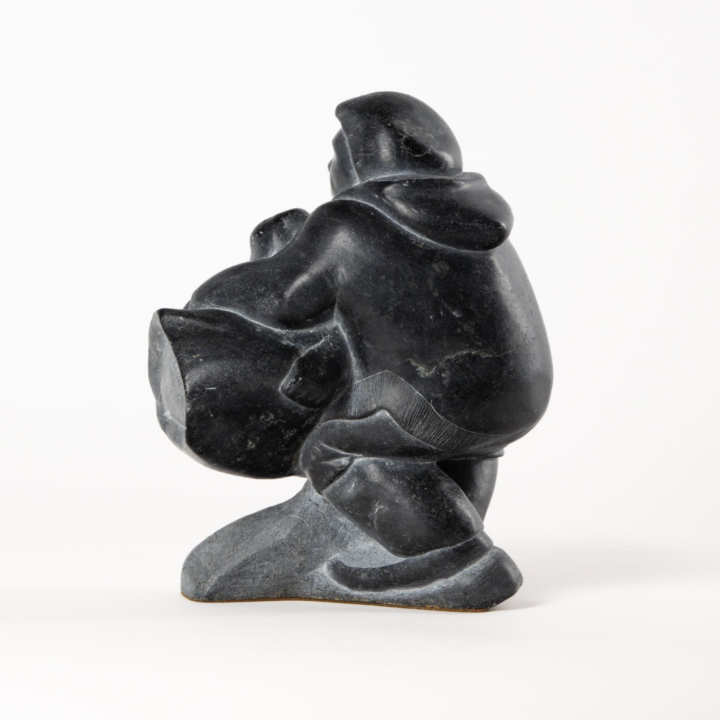Lucassie Tookalook | MAN HOLDING SEAL, 1967 (1967) | MutualArt