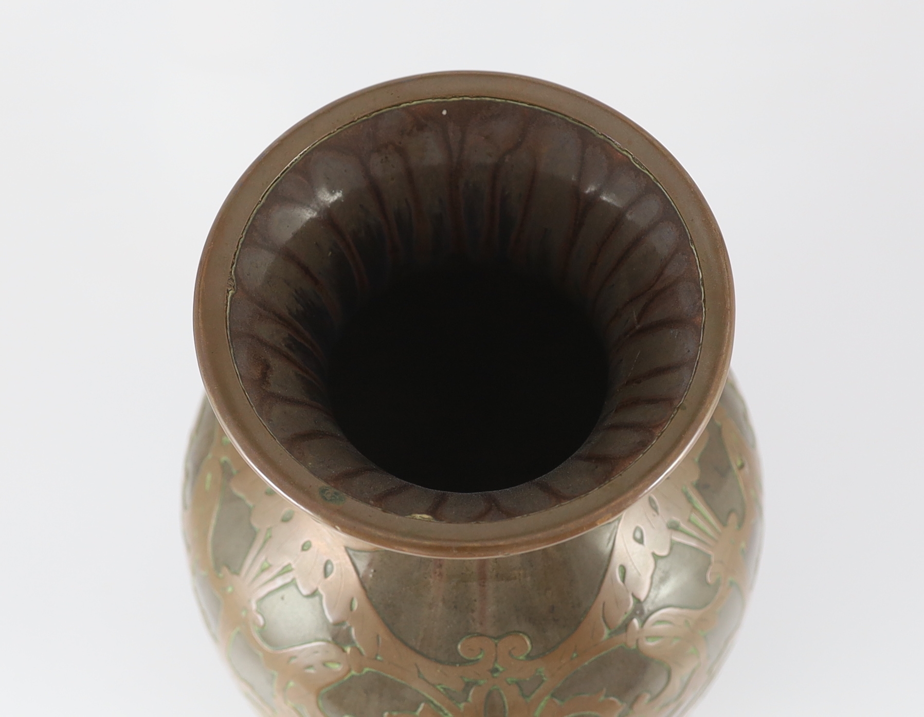 Peter Behrens | . An Art Nouveau pottery and copper overlaid vase by Marzi & Remy | MutualArt
