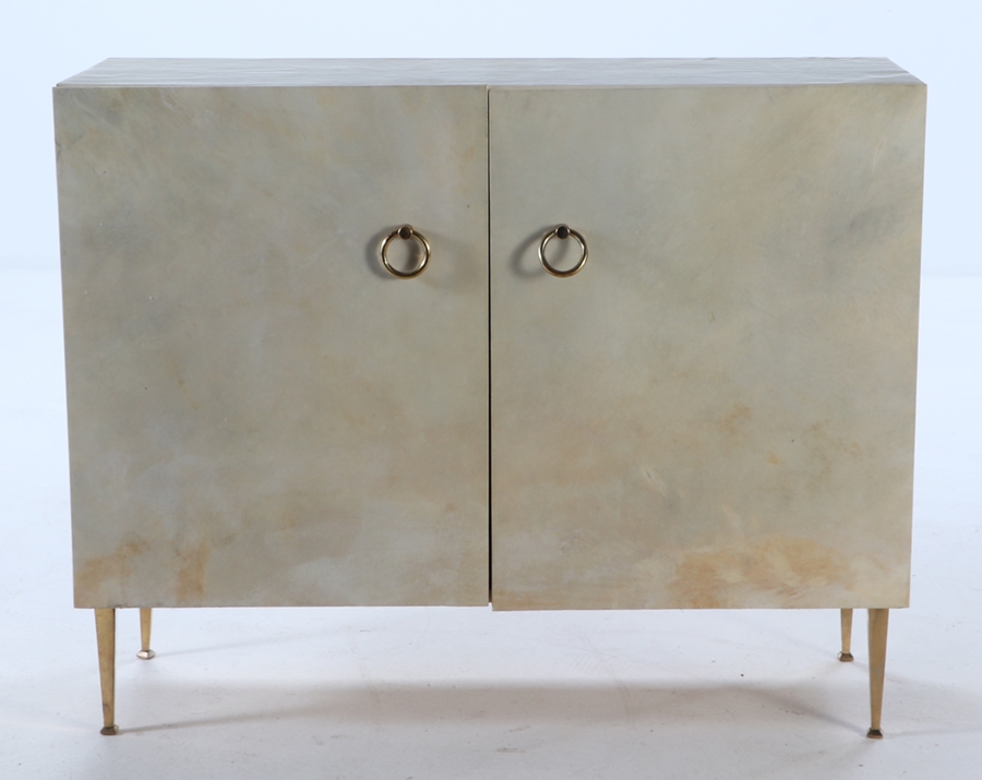 Samuel A. Marx | A two door parchment covered cabinet in the manner of ...