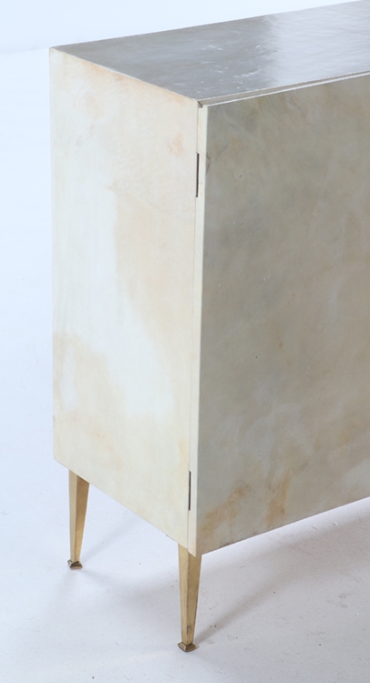 Samuel A. Marx | A two door parchment covered cabinet in the manner of ...