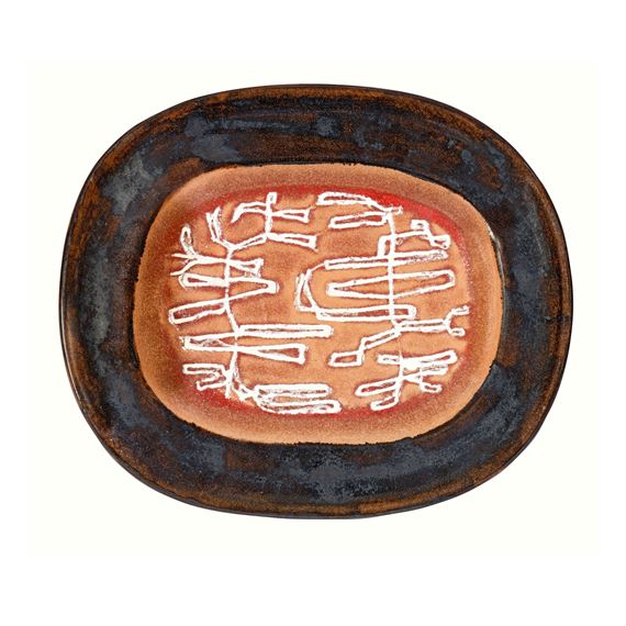 Jean Buffile | Large ceramic dish with black edges and white patterns ...