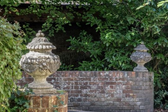 Austin And Seeley | A PAIR OF VICTORIAN STONE COMPOSITION LIDDED URNS ...