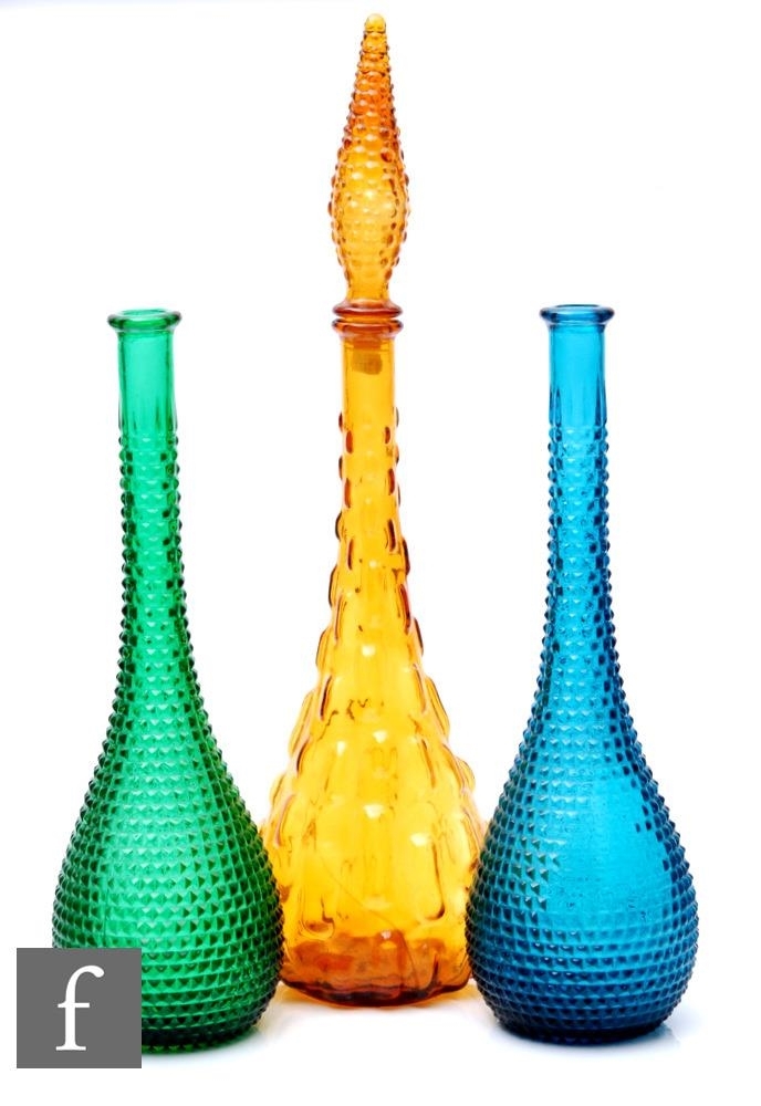 F. Empoli | A large Genie bottle in deep golden amber with a spire form ...